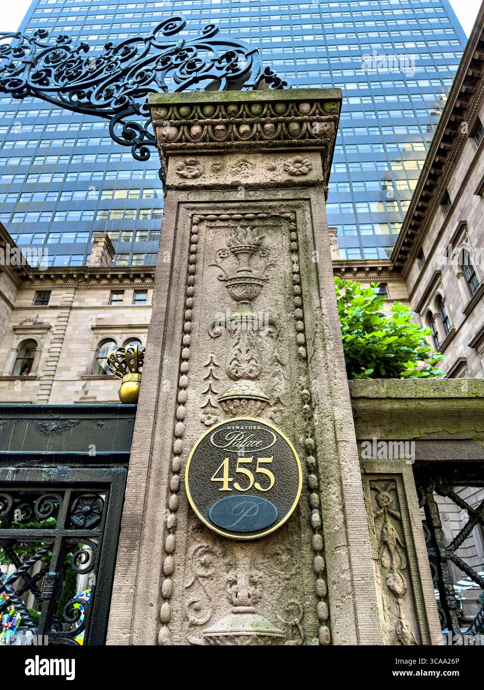 Entrance gate with ornate iron detail and column, Lotte New York Palace ...