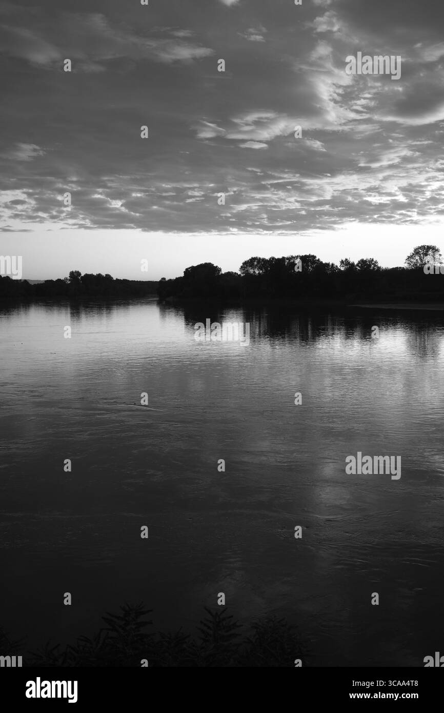 Sunset on soft water Black and White Stock Photos & Images - Alamy