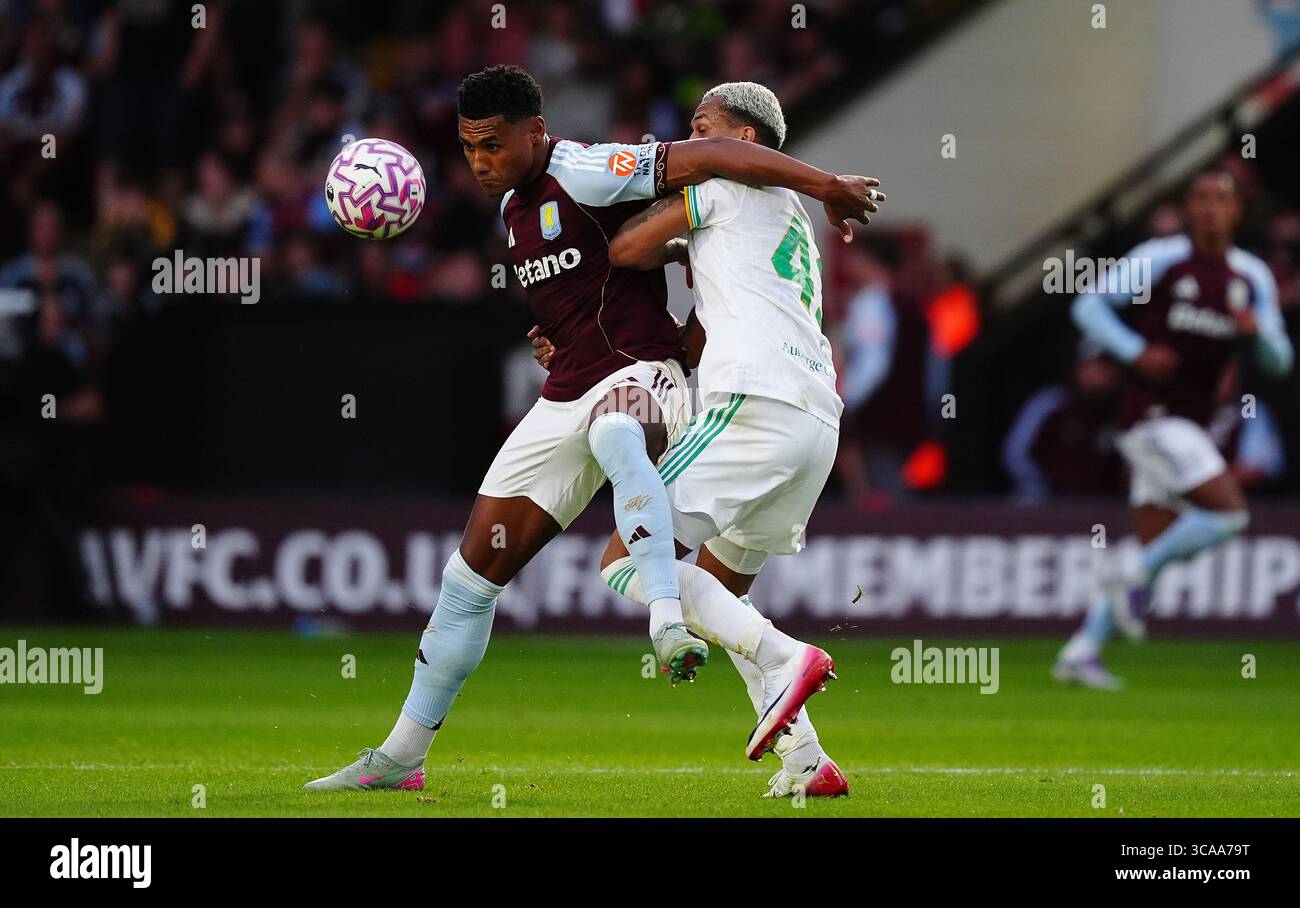 Aston Villa's Ollie Watkins (left) and Roma's Wesley battle for the ...
