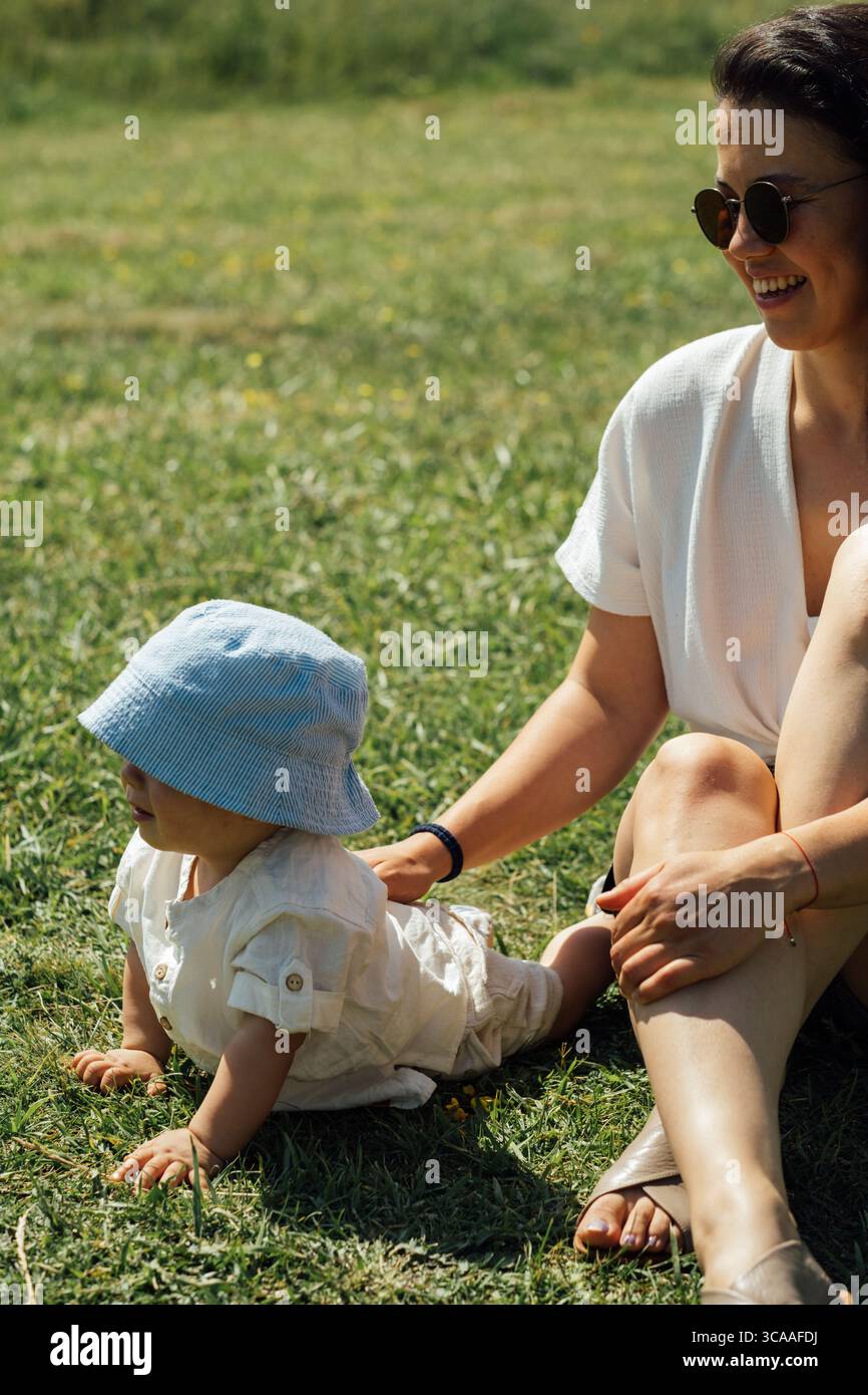 Casual candid holding baby infant hi-res stock photography and images ...