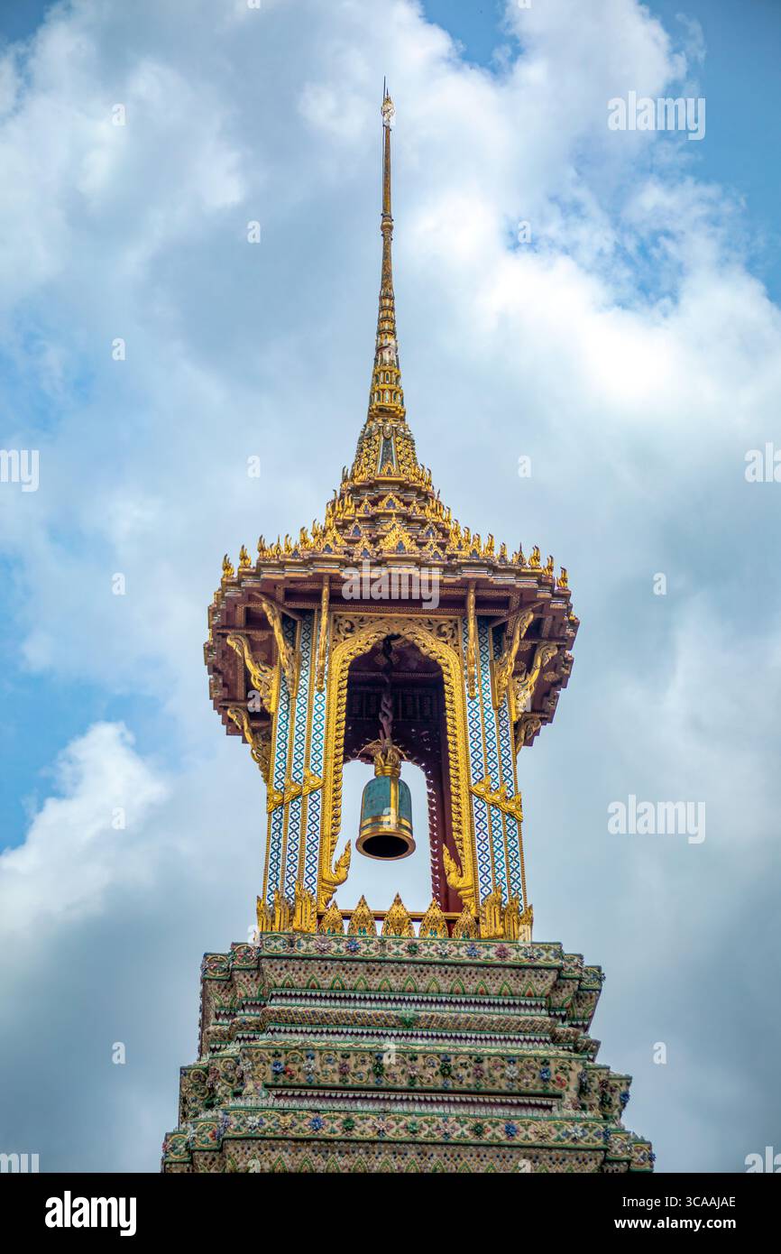 Vertical photo of the bell tower decorated with colorful tiles at the ...
