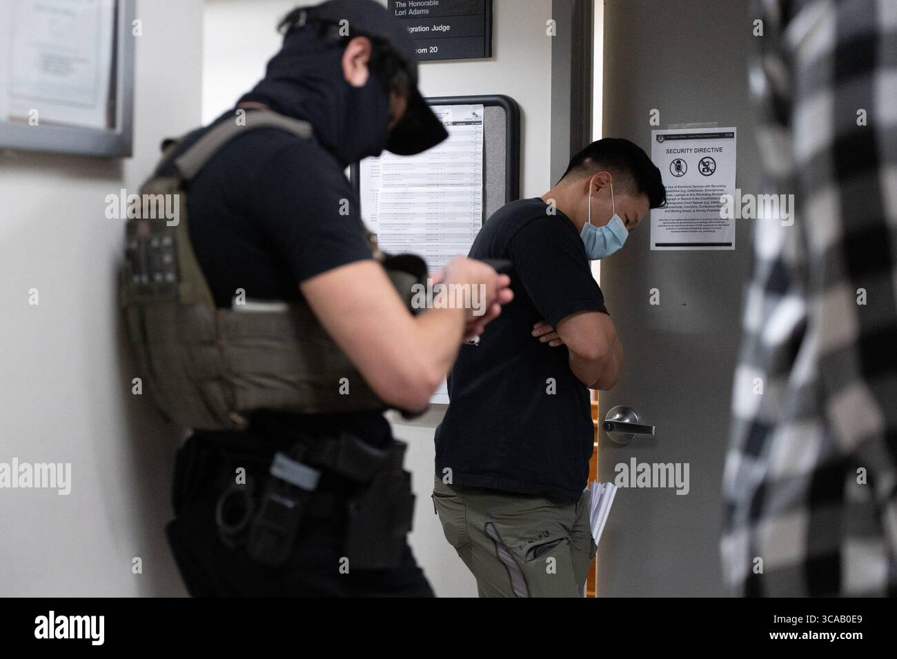 Masked ice agent hi-res stock photography and images - Alamy