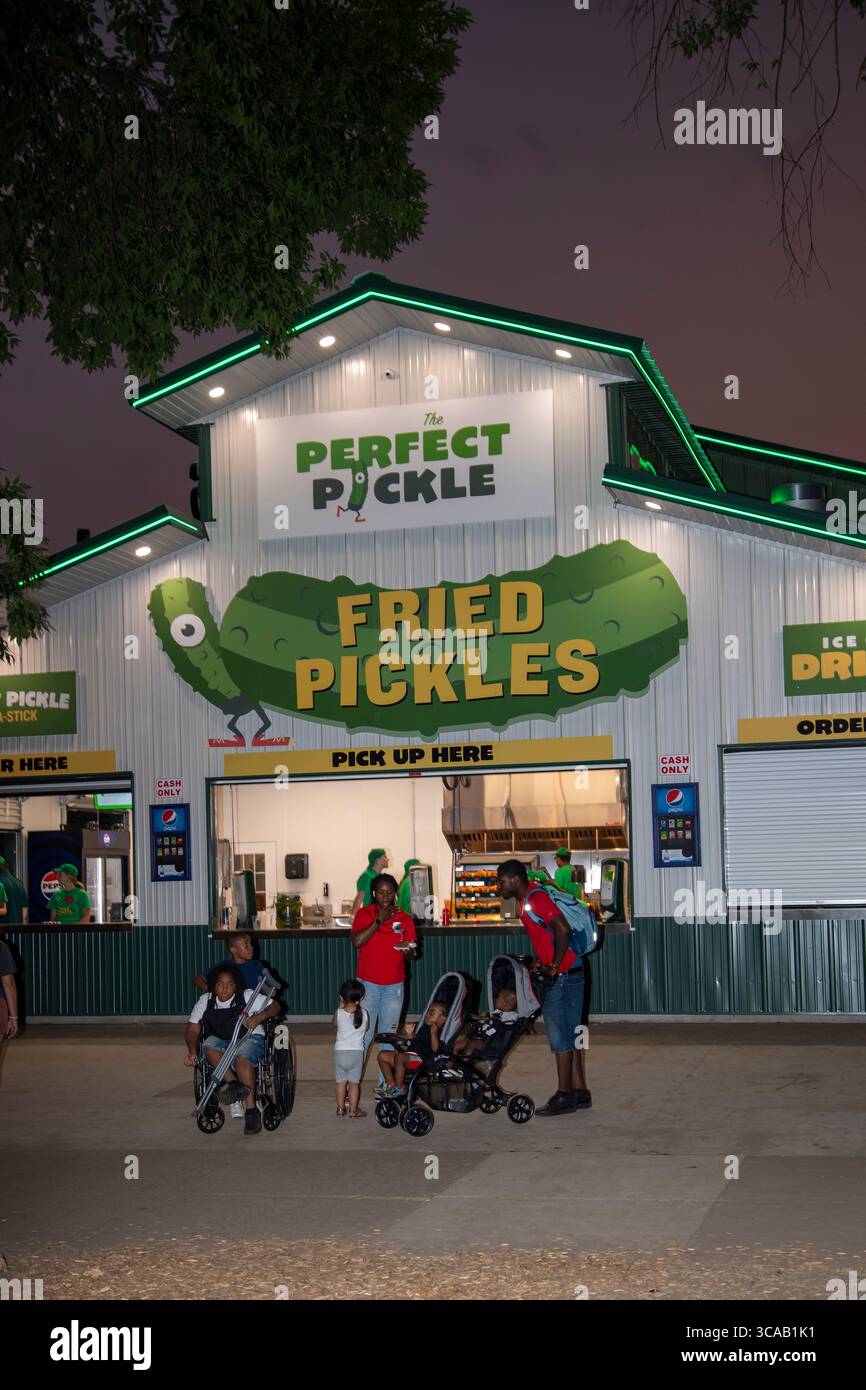 Falcon Heights, Minnesota. Minnesota state fair. People tasting the ...