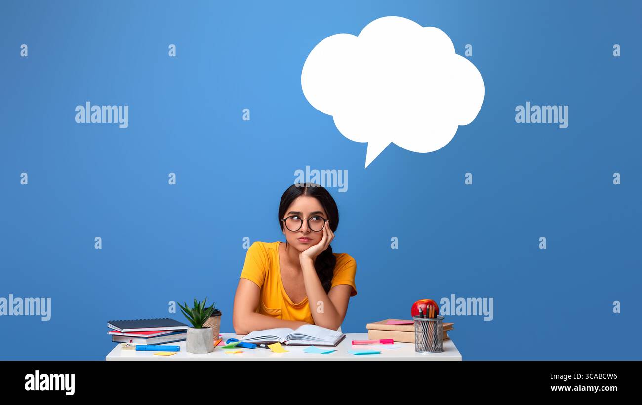 Pensive focused young indian hi-res stock photography and images - Alamy