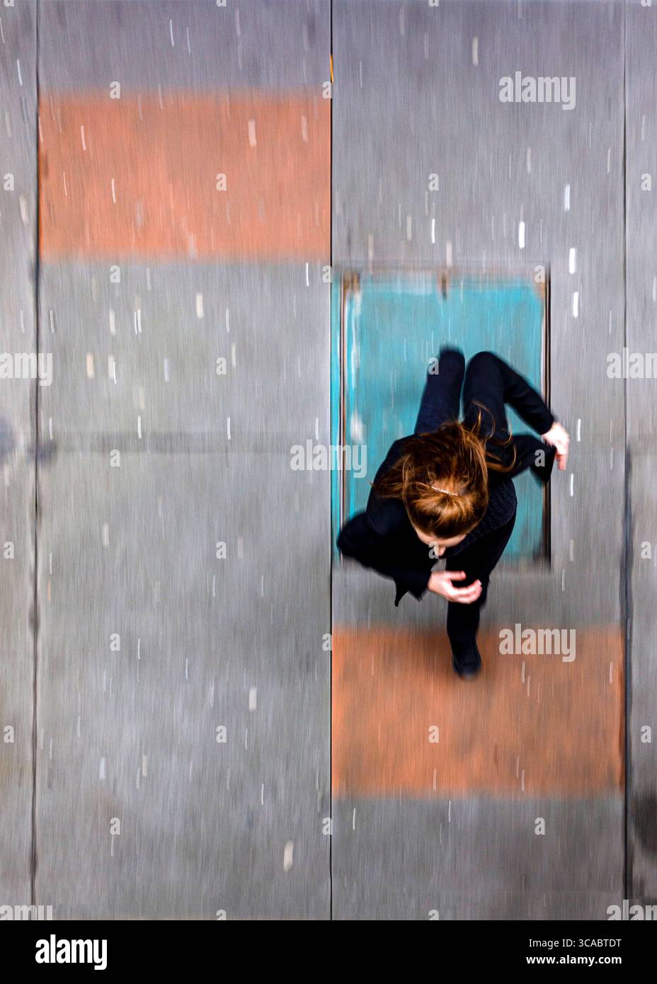 Person in black clothing hi-res stock photography and images - Alamy