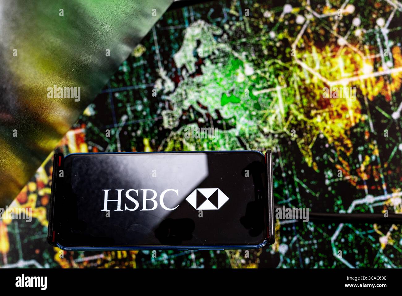 In this photo illustration the HSBC logo is shown on a mobile phone ...
