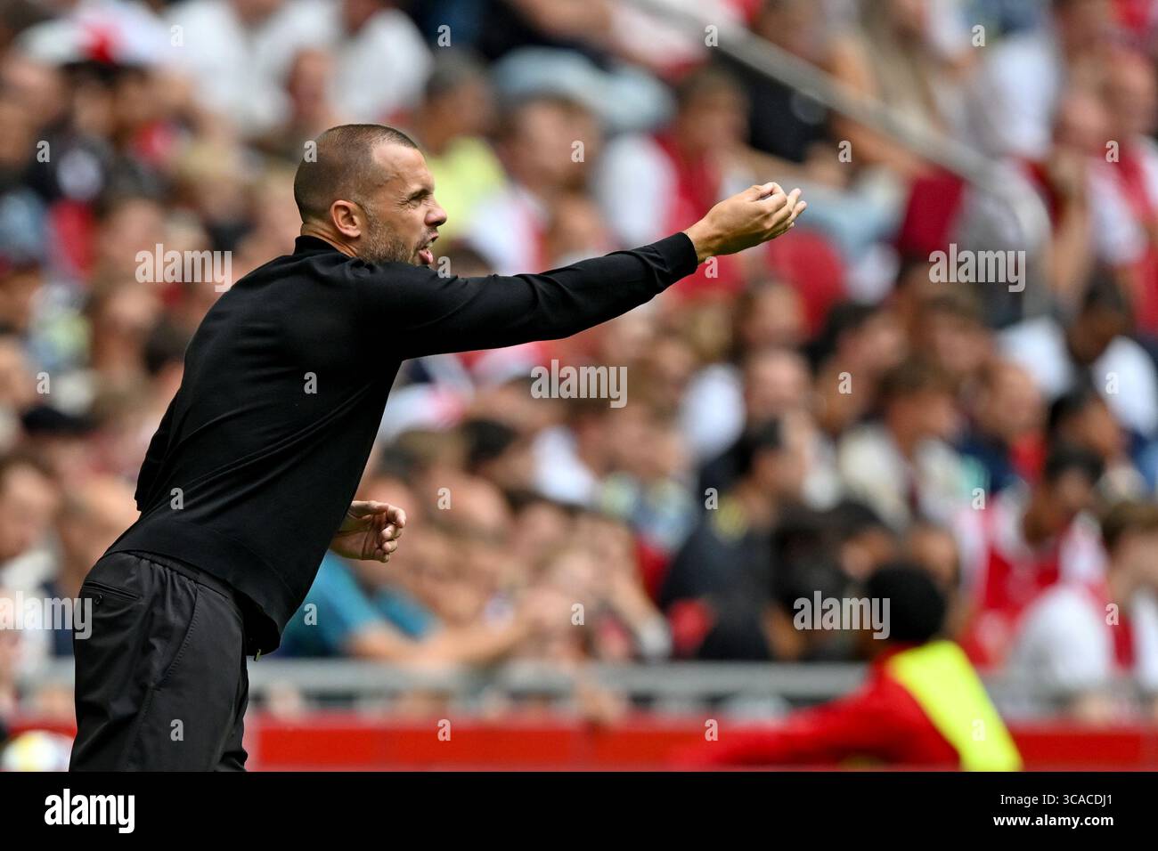 AMSTERDAM - Ajax coach John Heitinga during the practice match between ...