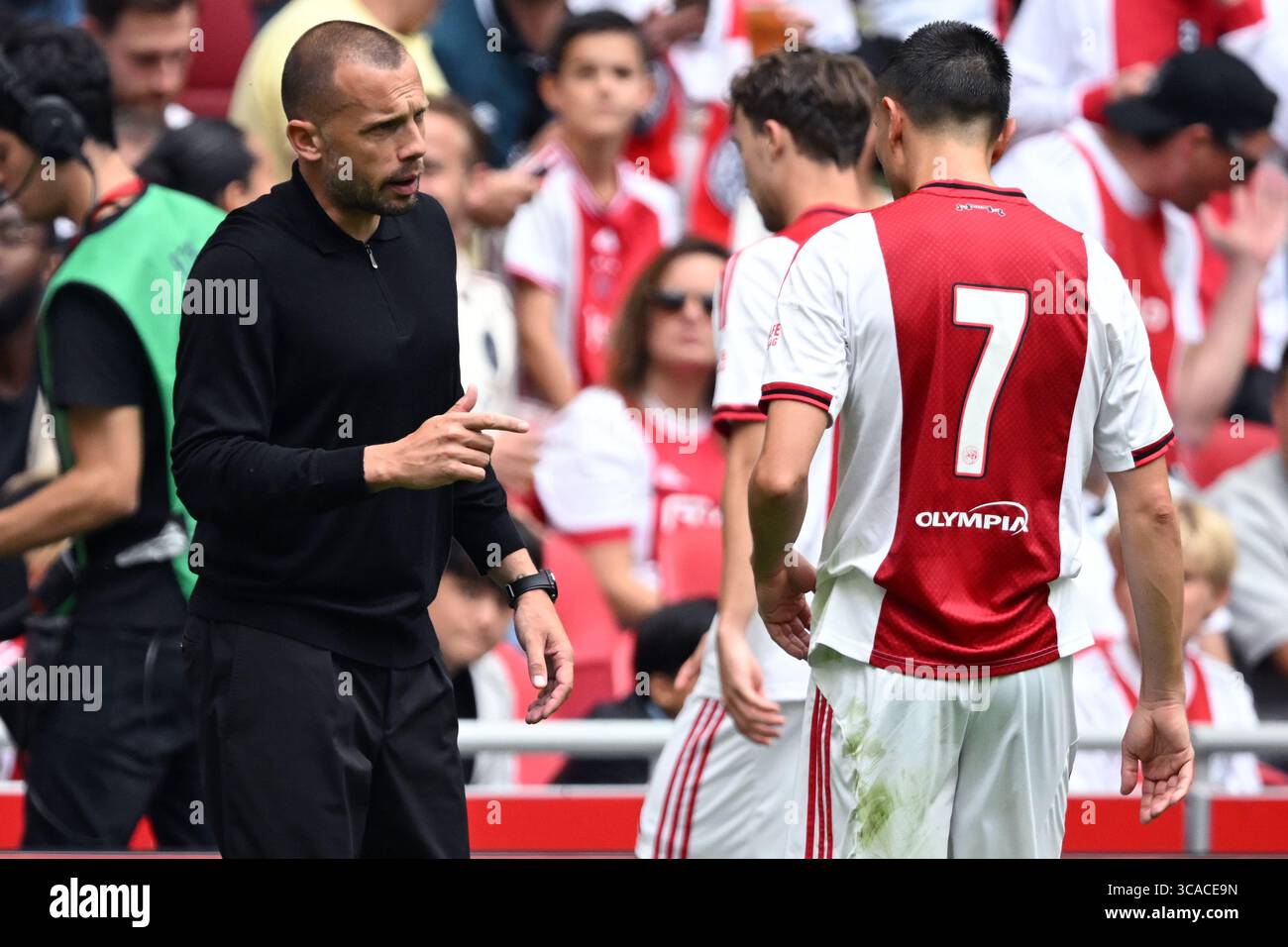 AMSTERDAM - (l-r) Ajax coach John Heitinga, Steven Berghuis of Ajax ...