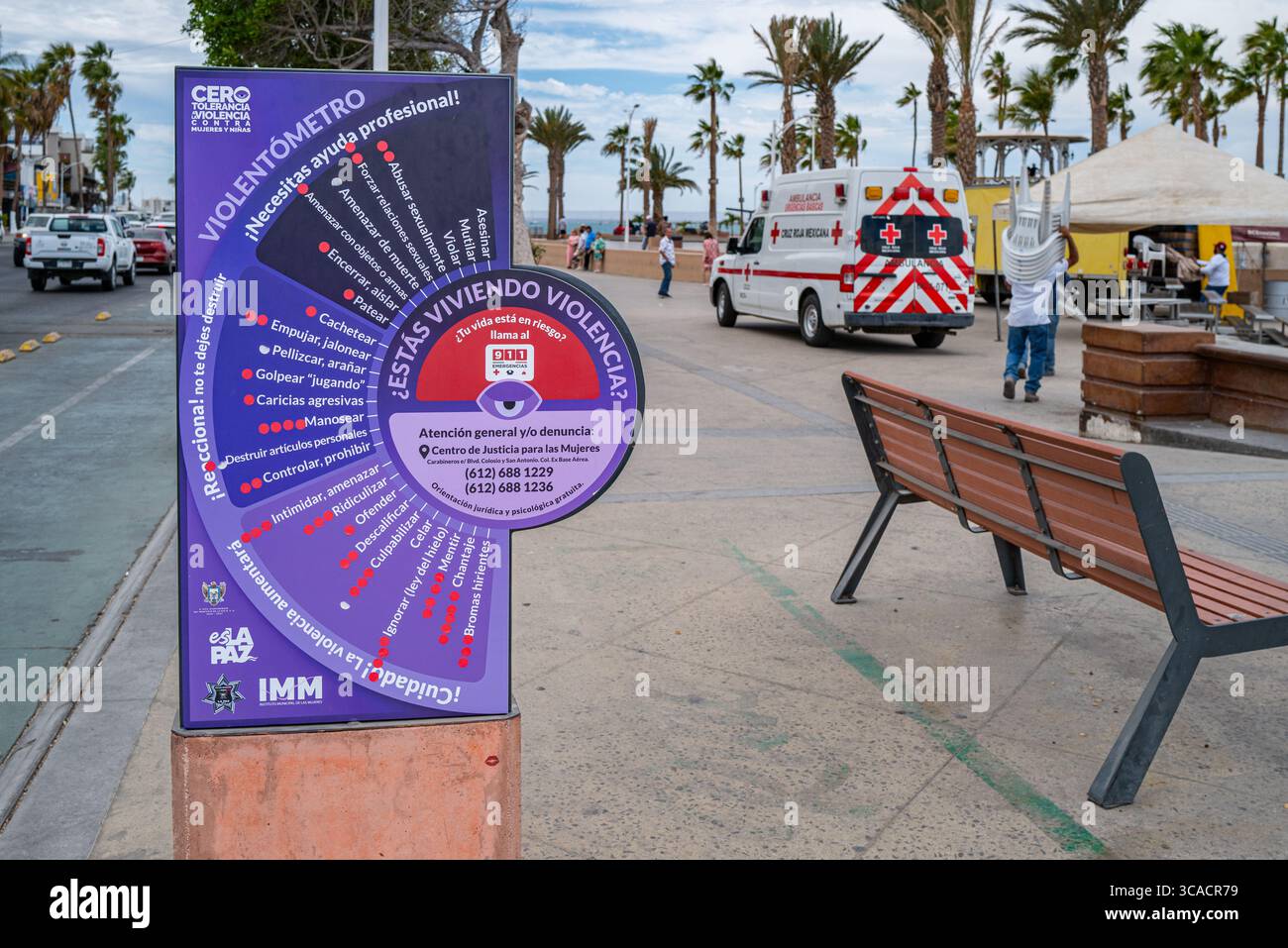 With an ambulance in the background, a "Violence Meter" allows passerbys on the Malecon to see ...