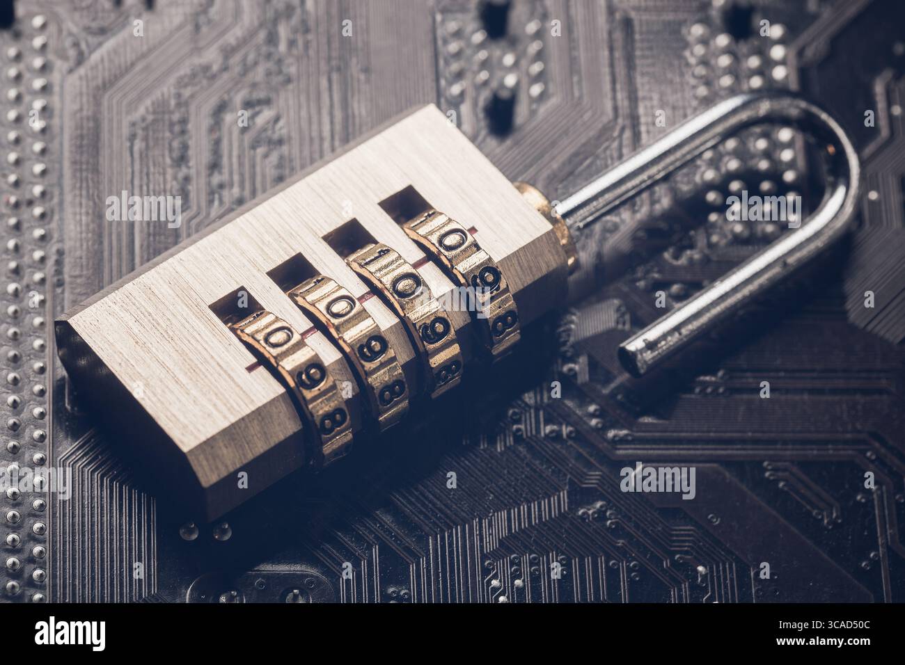 Opened padlock on computer motherboard. Internet data privacy ...