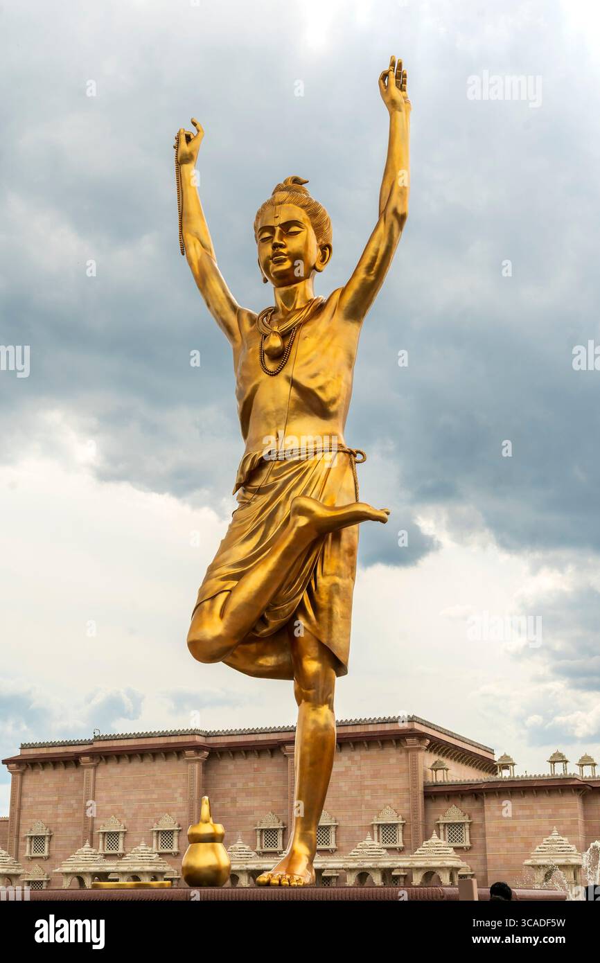 Robbinsville, NJ - US - Aug 2, 2025 A 49-foot golden statue of Bhagwan ...