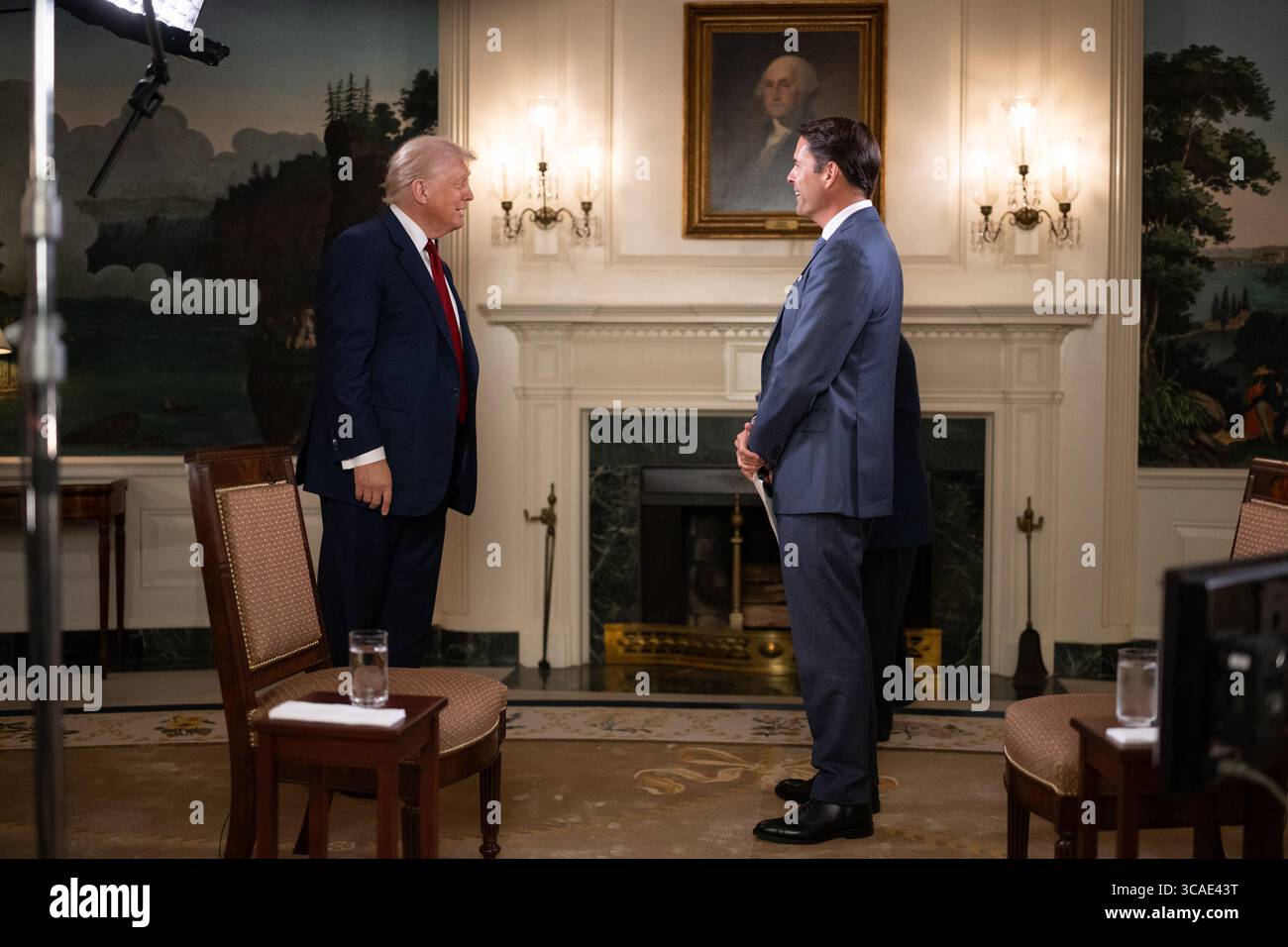 President Donald Trump participates in an interview with Rob Finnerty ...