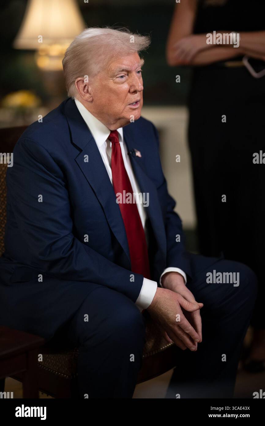 President Donald Trump participates in an interview with Rob Finnerty ...