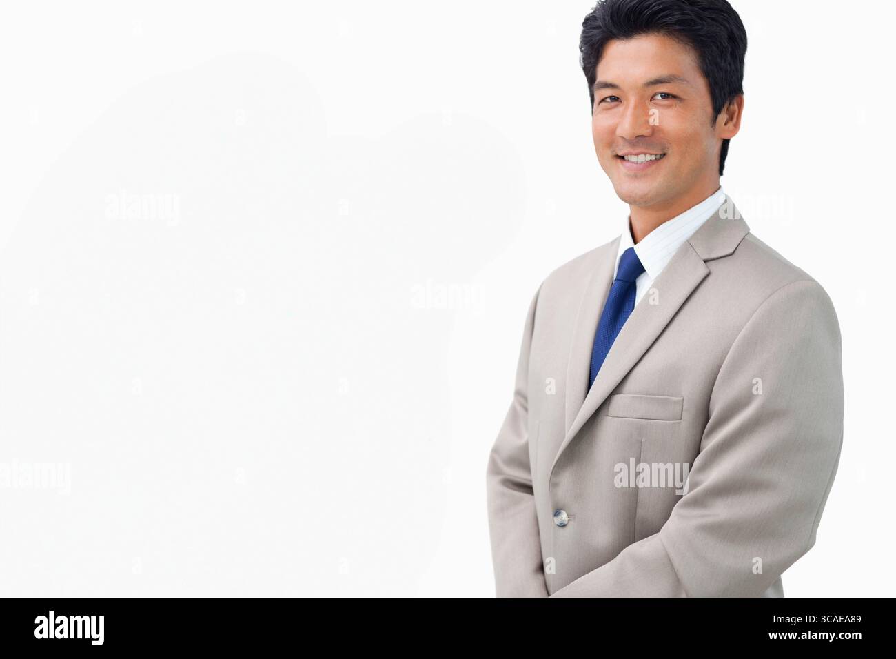 Man in beige suit Cut Out Stock Images & Pictures - Alamy