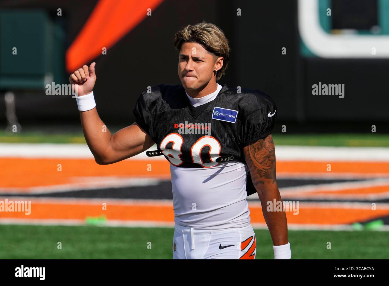 Cincinnati Bengals wide receiver Andrei Iosivas (80) walks onto the field during practice at the ...