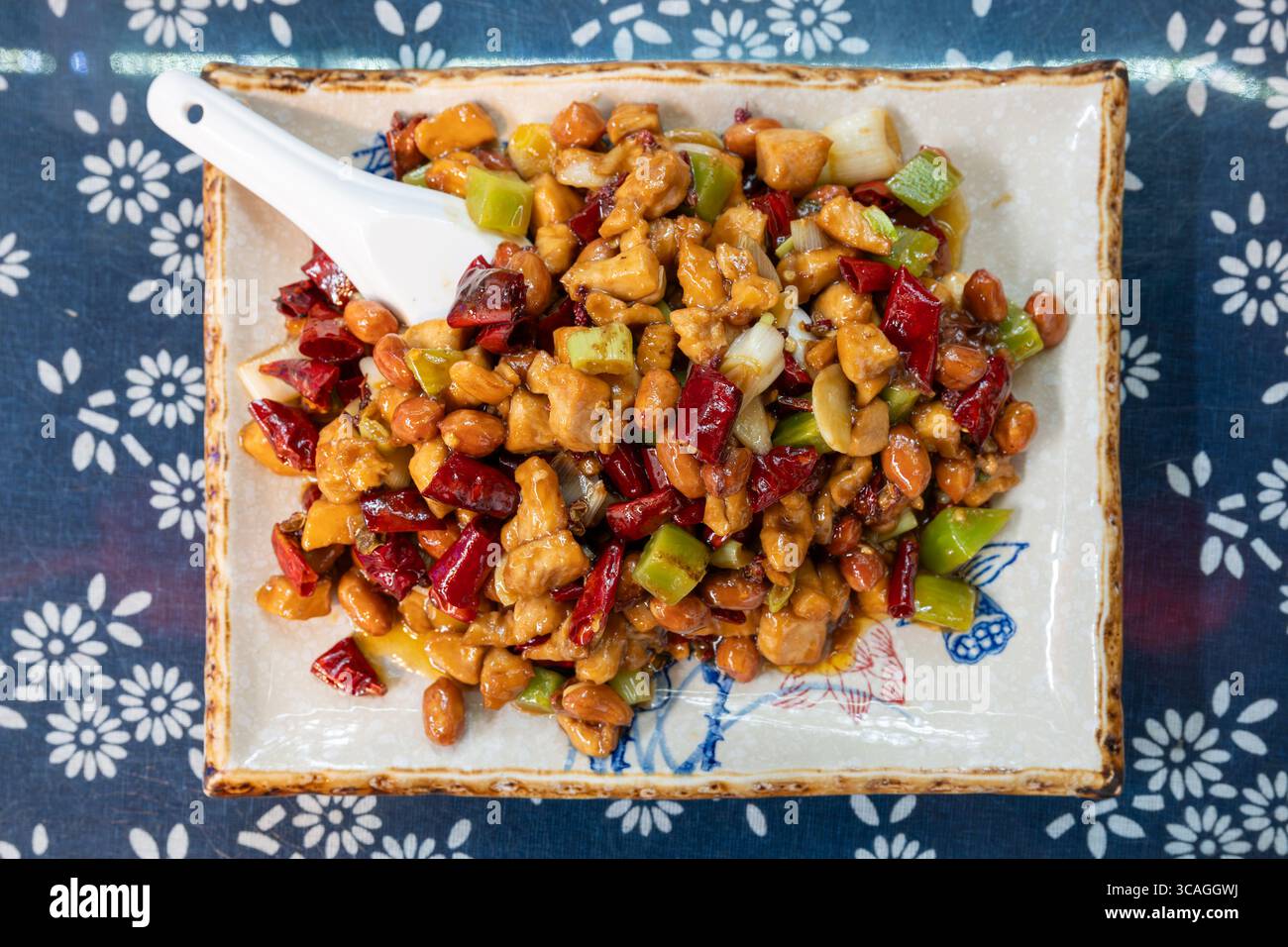 Gong Bao Ji Ding. Delicious kung pao chicken served with peanuts Stock ...