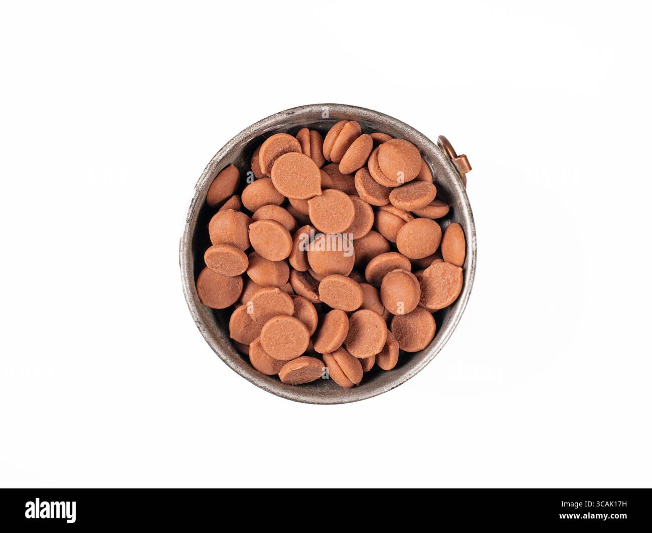 This image features a top view, close-up shot of a cup filled with rich ...