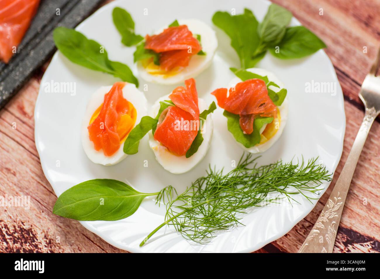Portioned appetizer egg halves salmon hi-res stock photography and ...
