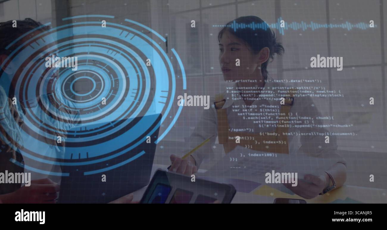 Collaborating colleagues reviewing code hi-res stock photography and ...
