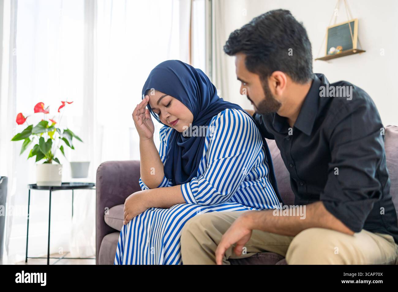 Man supporting wife during hi-res stock photography and images - Alamy