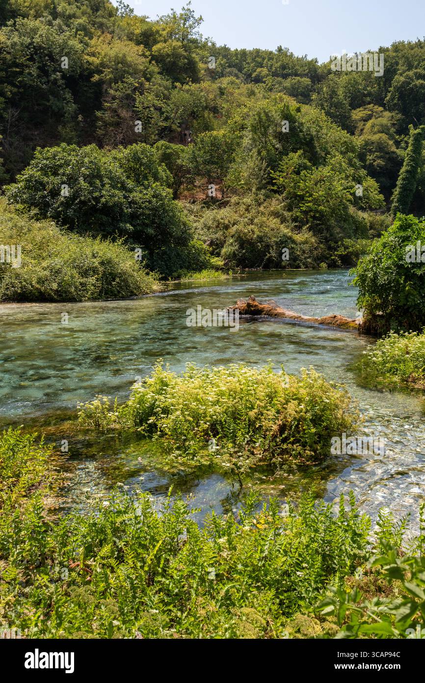 Blue Eye spring in Sarande, Albania, with flowing clear water, ripples ...