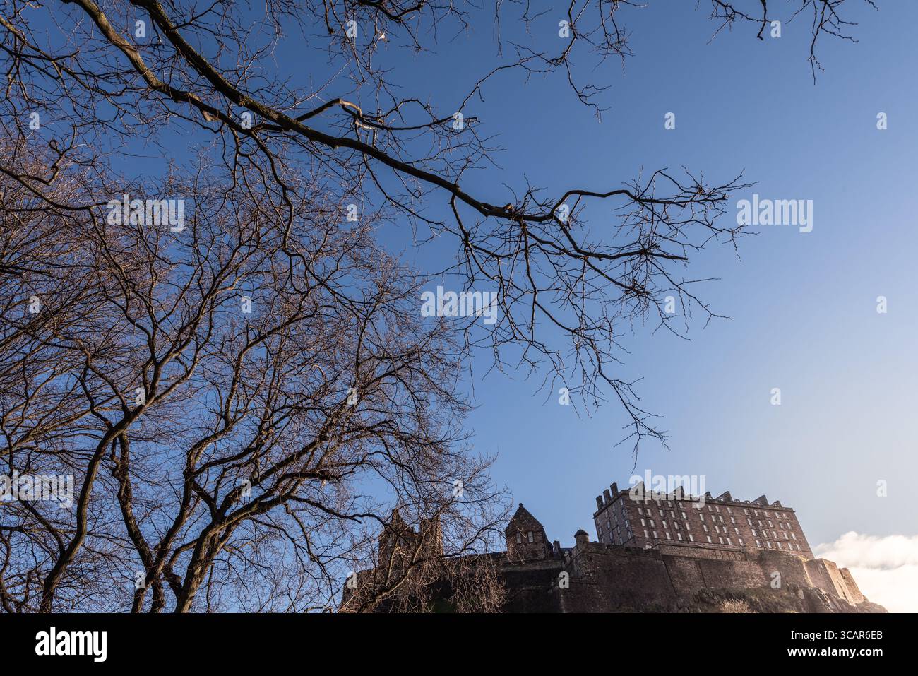 Edinburgh Castle seen from below in the grounds of the Parish Church of ...