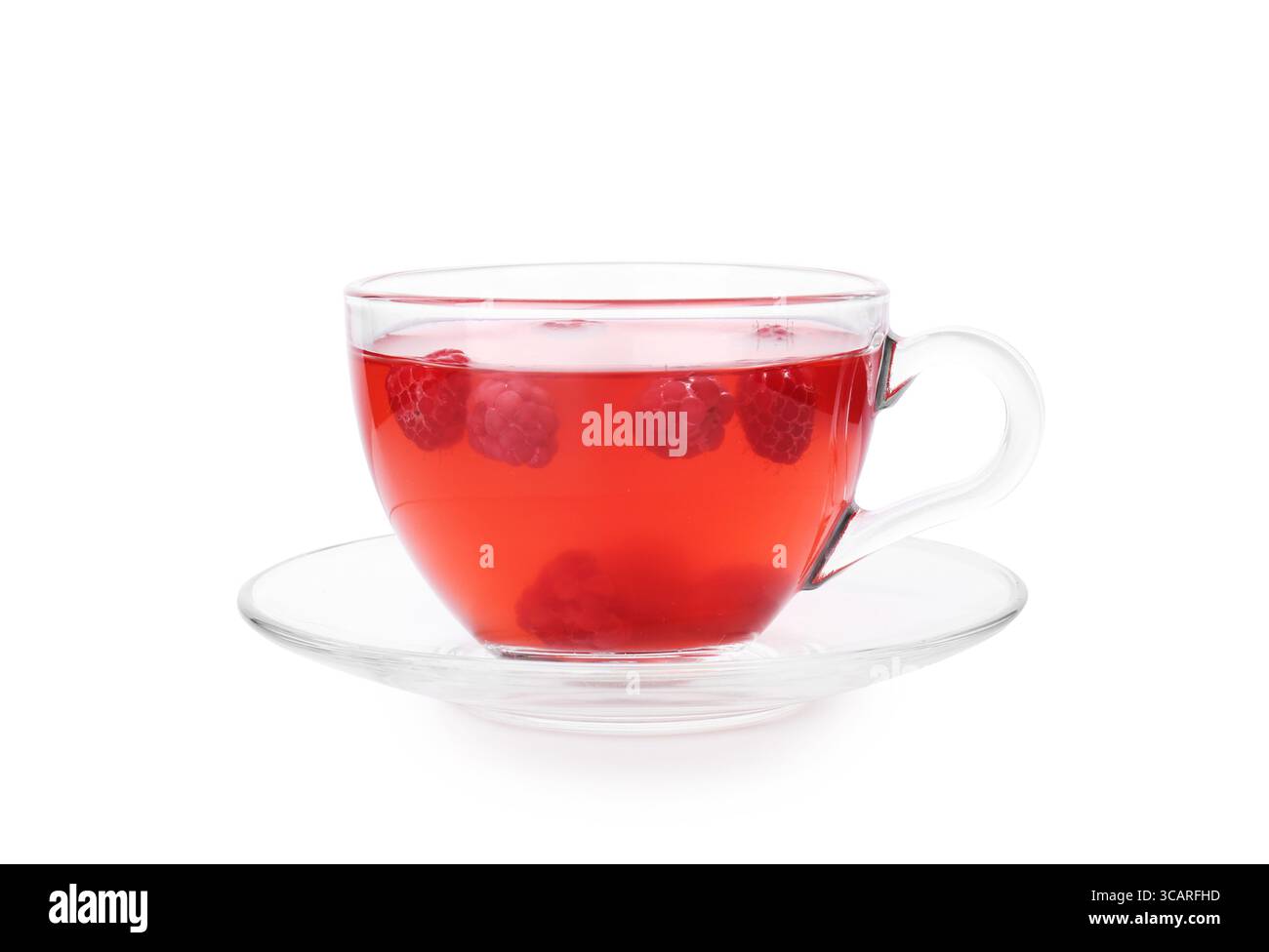 Glass tea cup raspberries Cut Out Stock Images & Pictures - Alamy