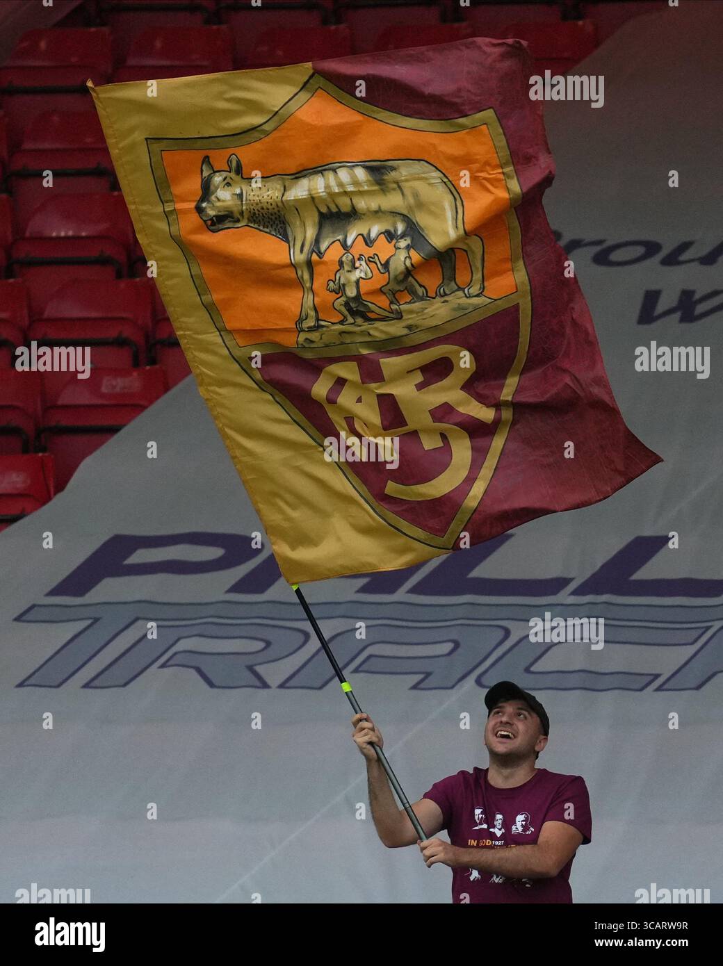 Walsall, UK. 07th Aug, 2025. AS Roma fan with flag during the pre ...