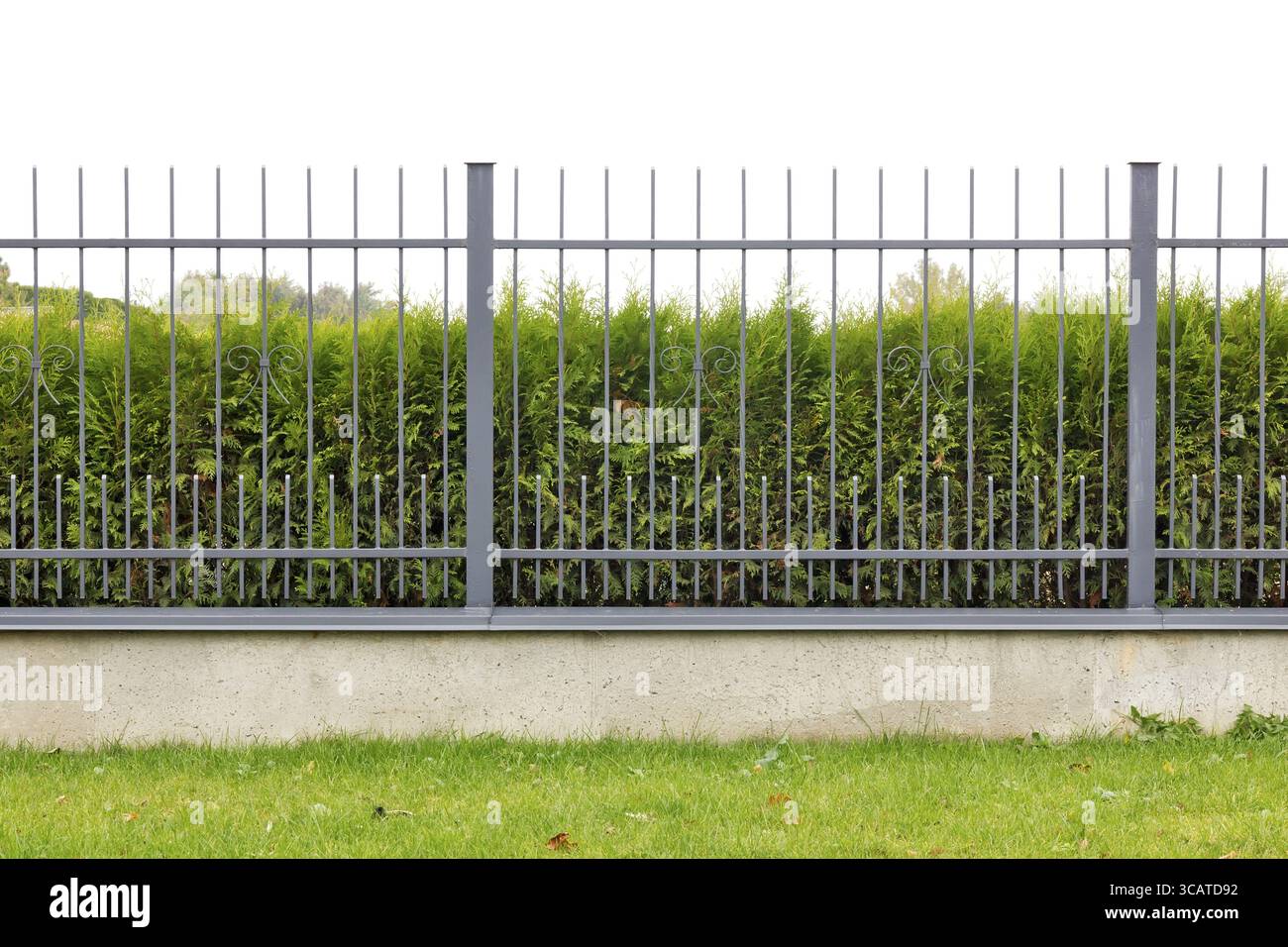 Metal village mass production fence painted in gray isolated fragment ...