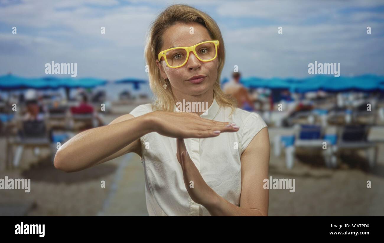 Blonde woman makes timeout hi-res stock photography and images - Alamy