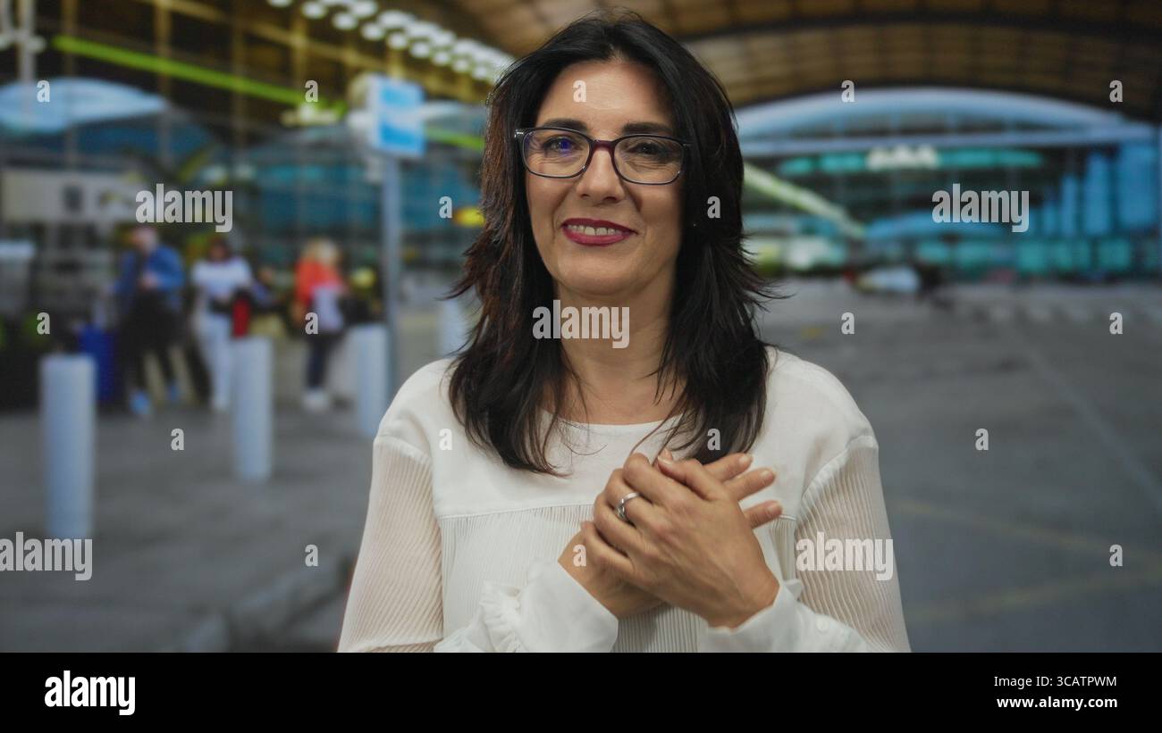 Woman glasses smiles broadly camera hi-res stock photography and images ...