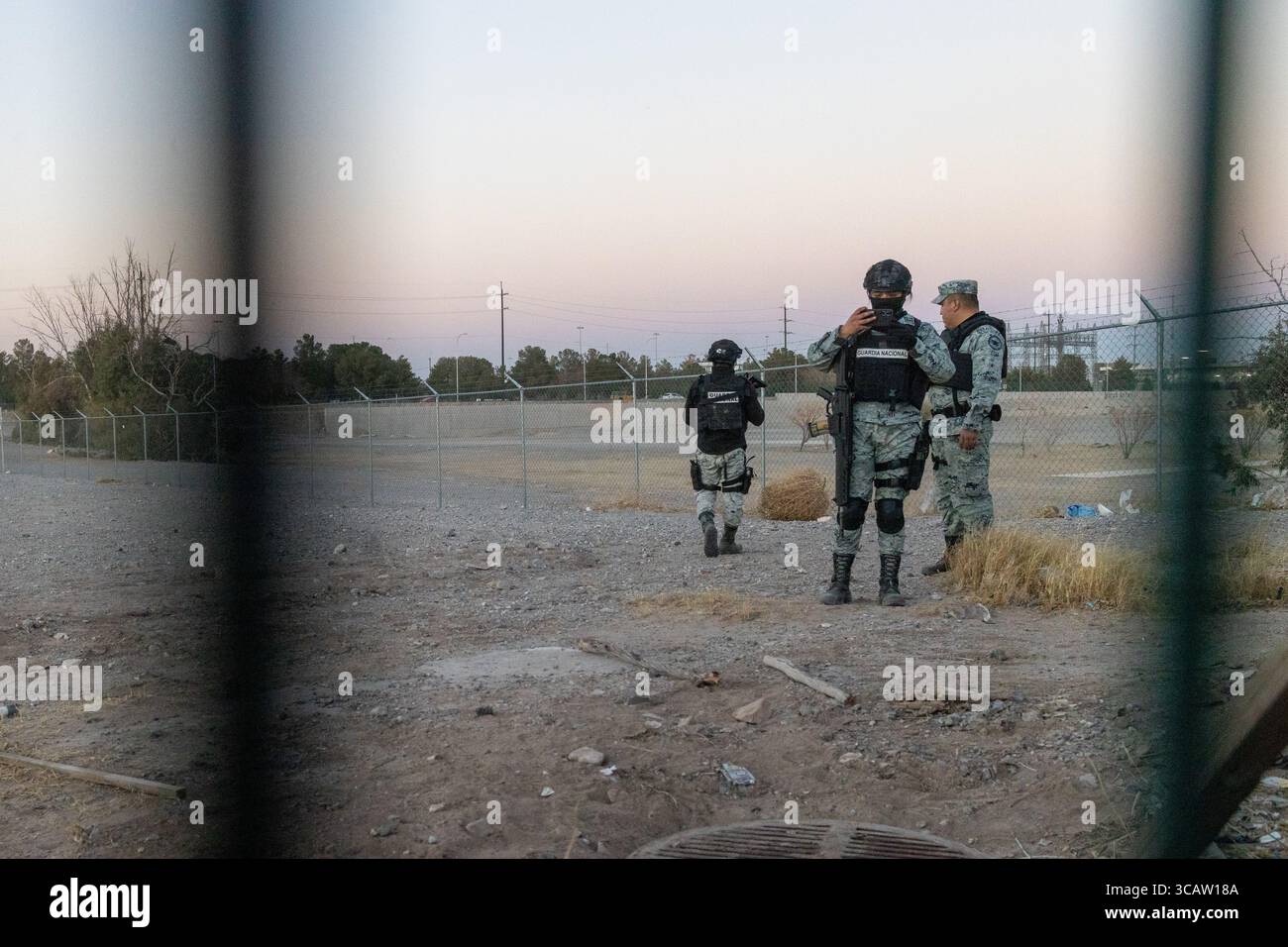 Military personnel patrol a border near Ciudad Juarez, monitoring ...