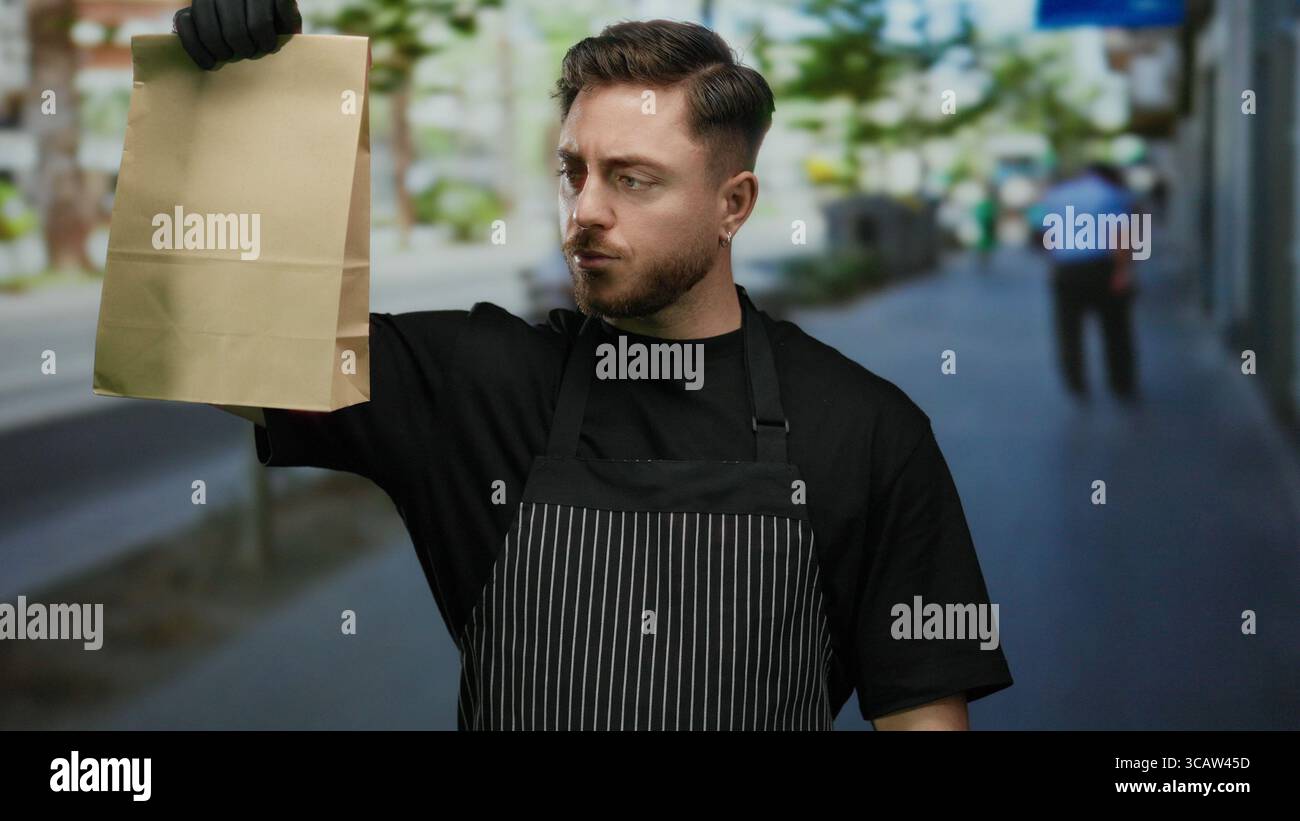 Young waiter wearing gloves holds hi-res stock photography and images ...