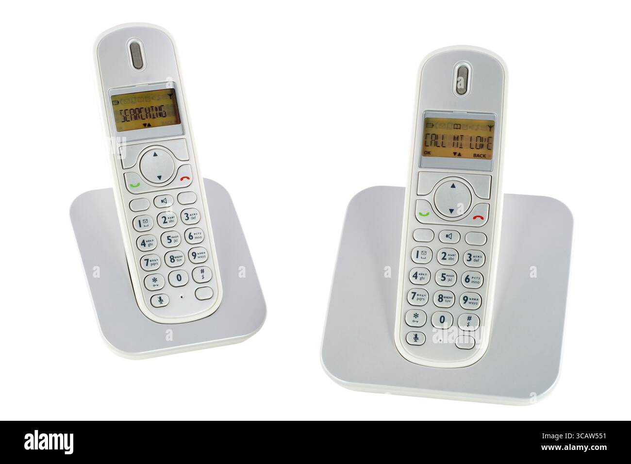 Two white phones. On the display of one of them indication Call Me Love ...