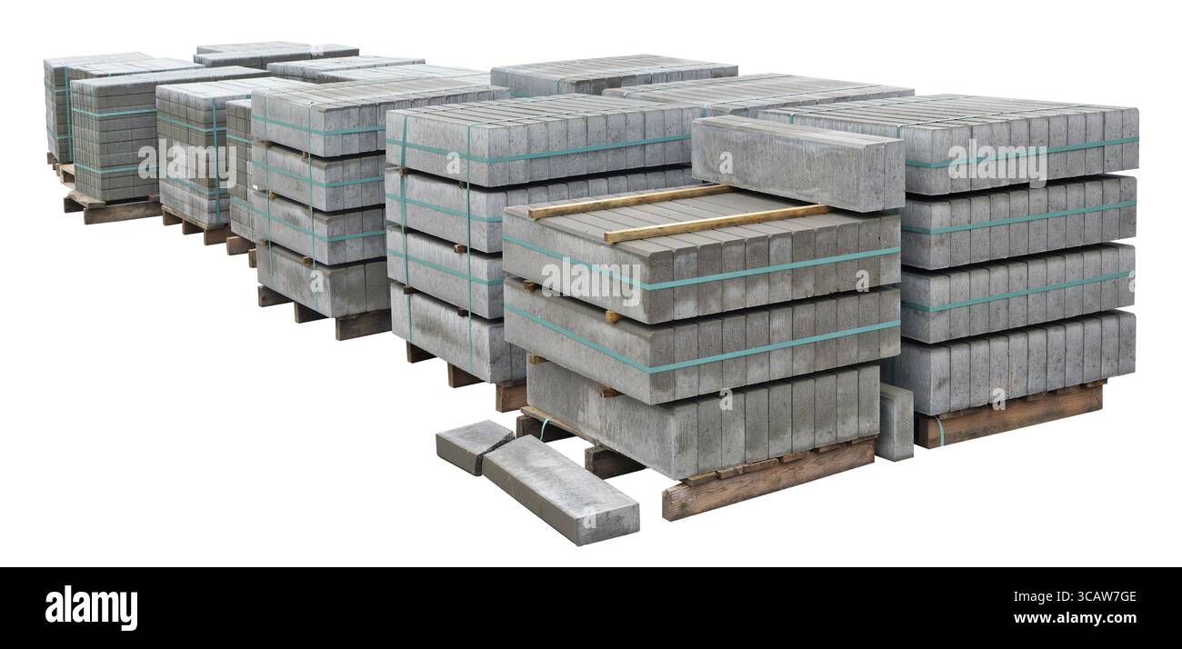 Stacks of new concrete paving slabs on wooden palettes . Isolated on ...