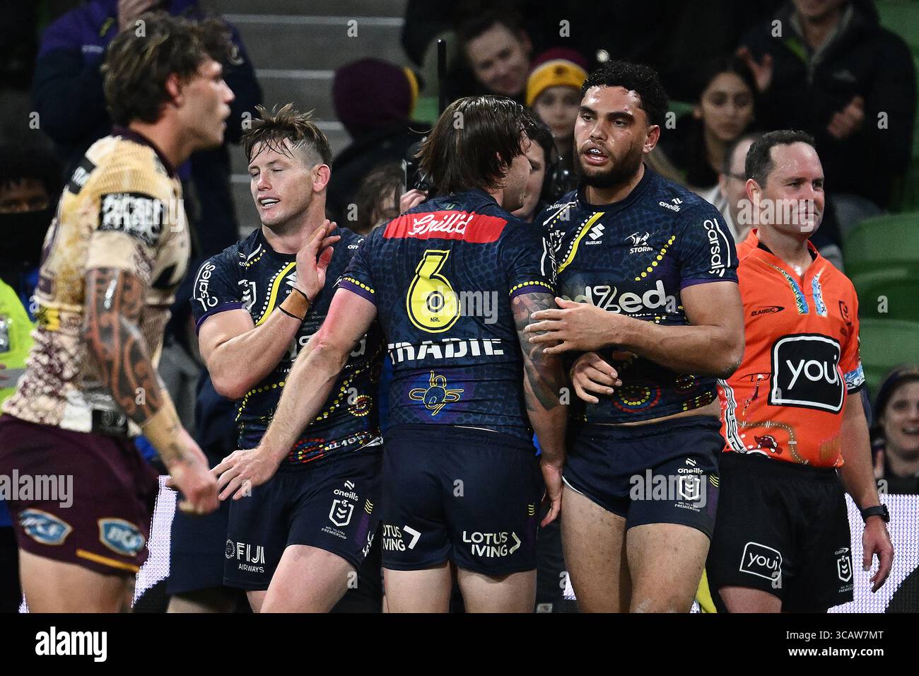 Xavier Coates of the Storm celebrates scoring a try during the NRL ...