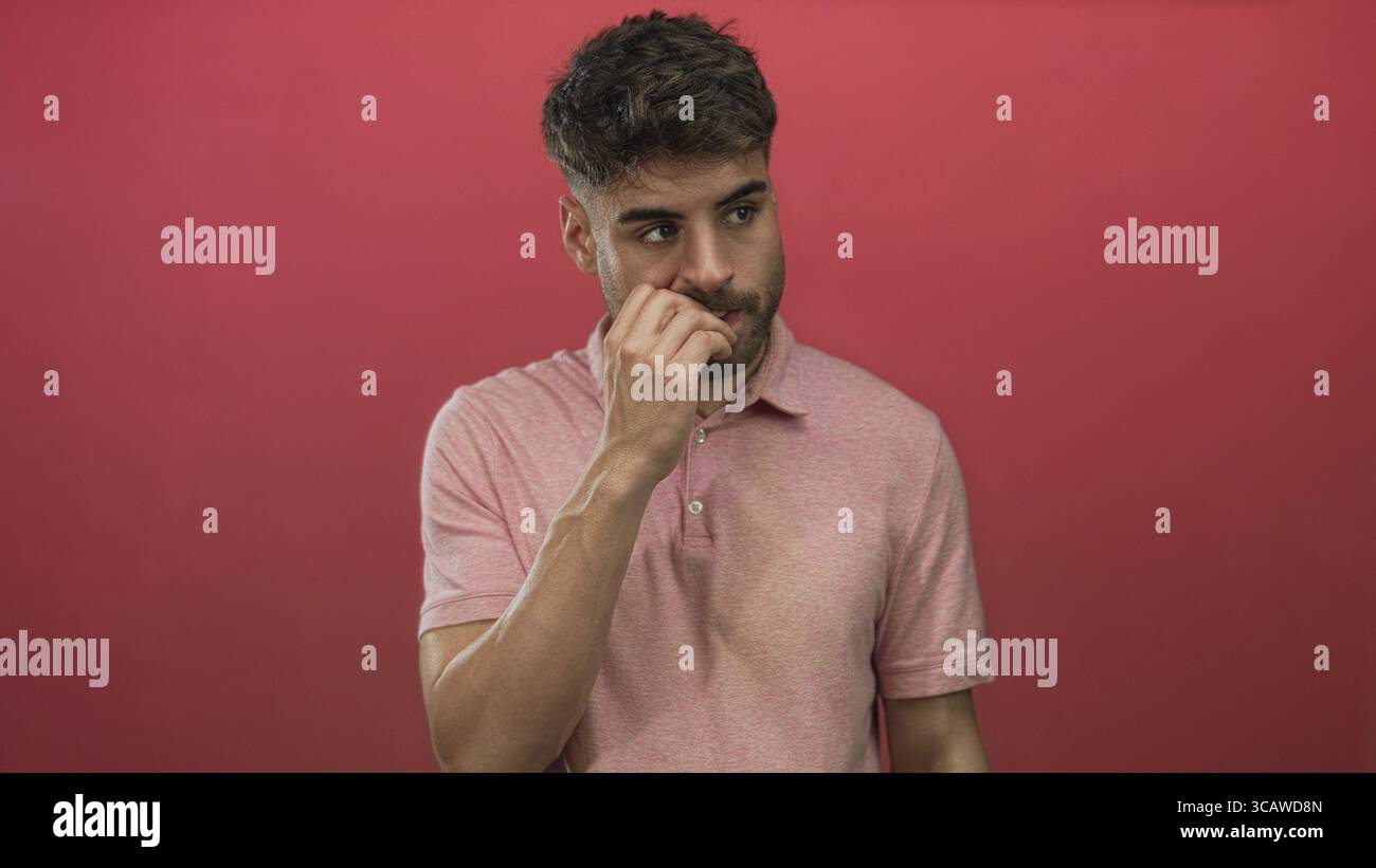 Man biting nails with visible hands and pressing thumb to lower lip ...
