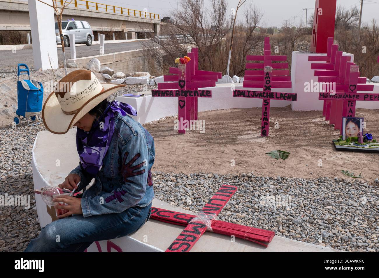 A person mourns at a memorial for femicide victims in Ciudad Juarez ...
