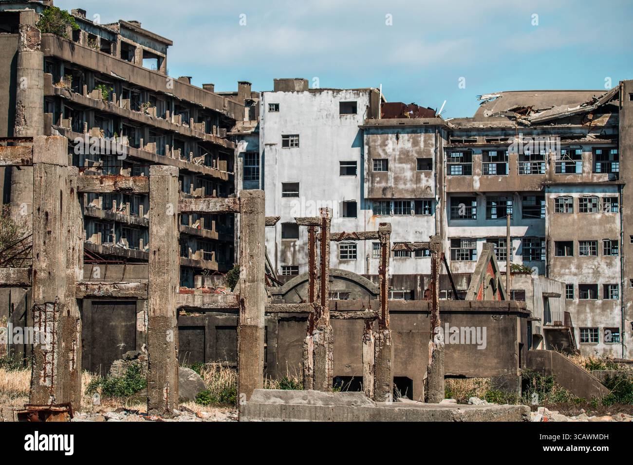 Abandoned concrete buildings on Gunkanjima (Hashima Island) off the ...