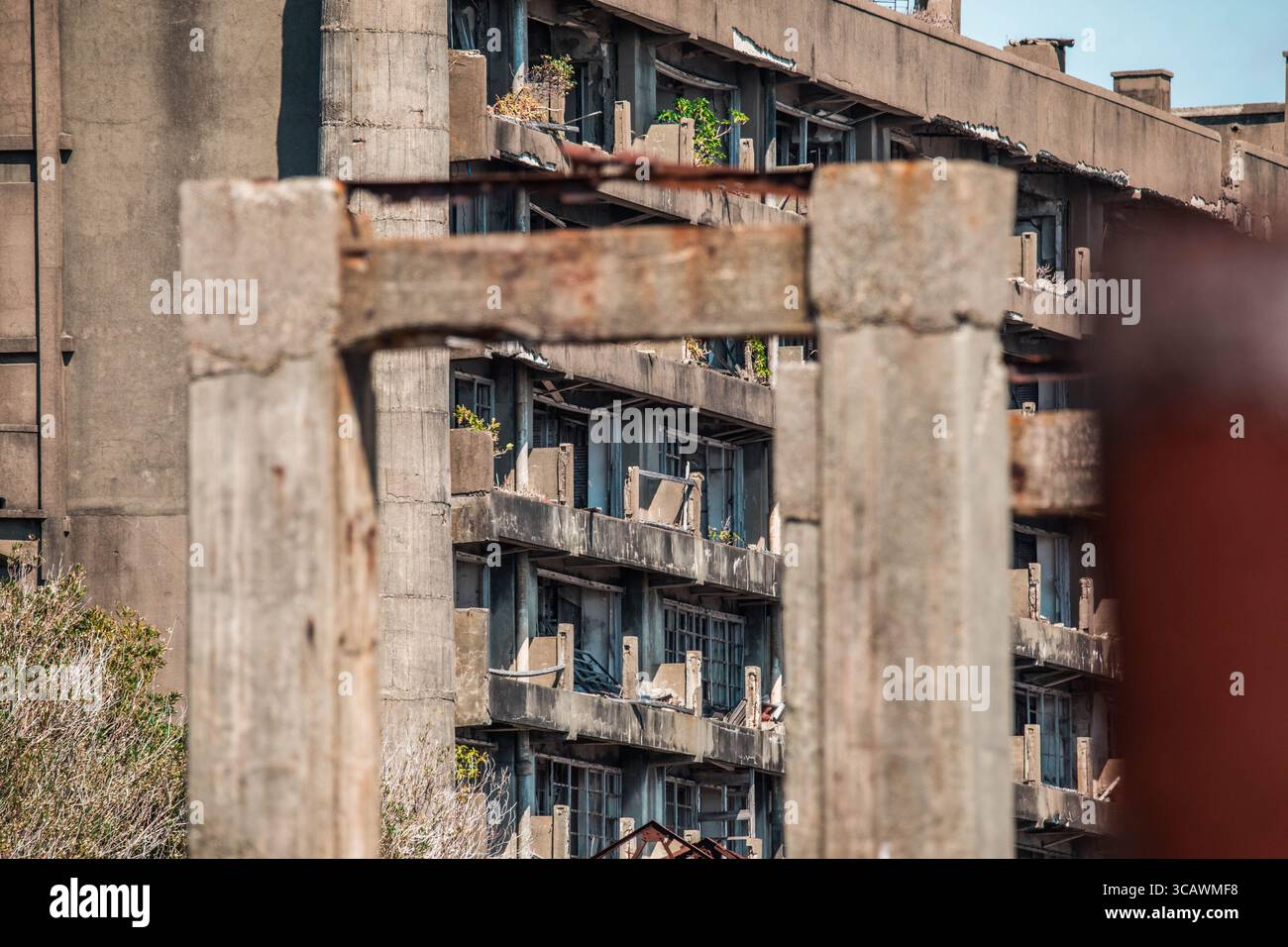 Abandoned concrete buildings on Gunkanjima (Hashima Island) off the ...