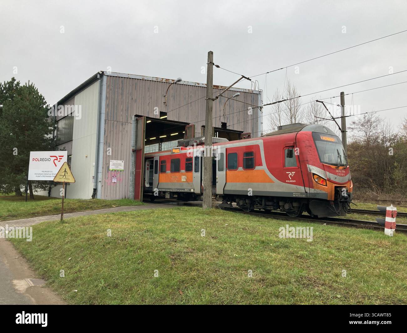 Polish commuter train parked in a depot, showing modern railway ...