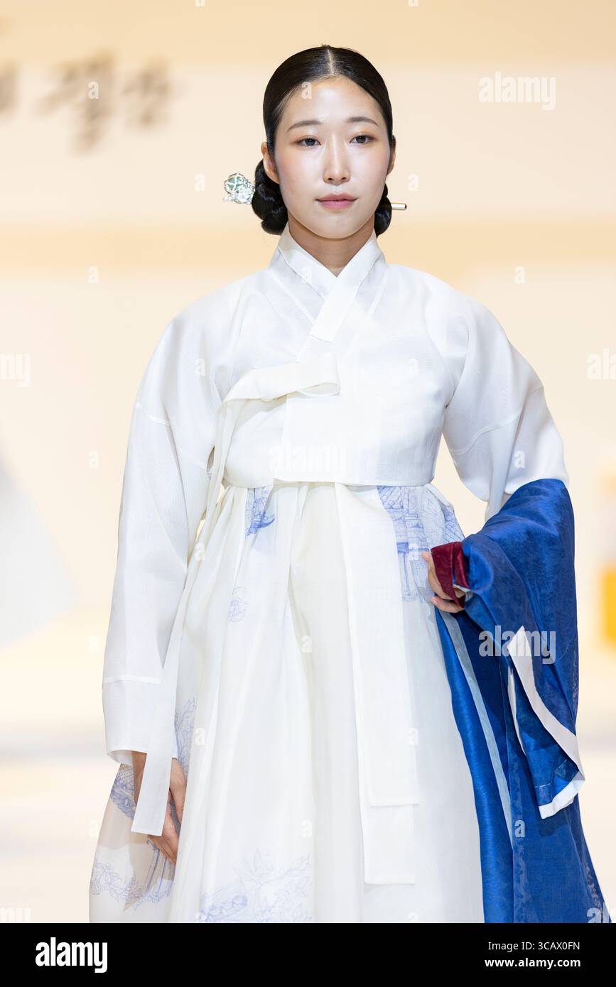 Models present hanbok designs during the opening fashion show of the ...