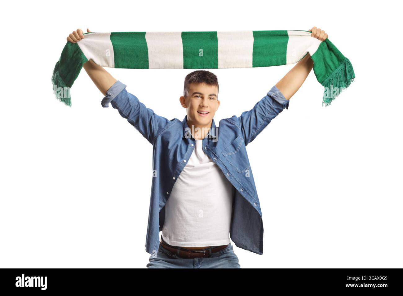 Happy young man celebrating and cheering with a scarf isolated on white ...