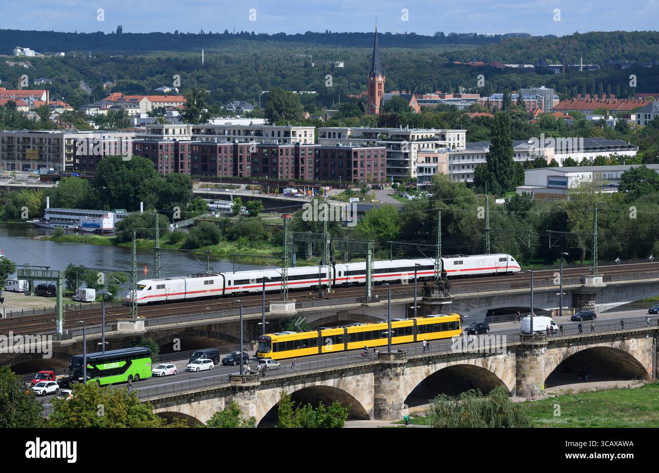 06 August 2025, Saxony, Dresden: A Deutsche Bahn (DB) ICE train, a ...