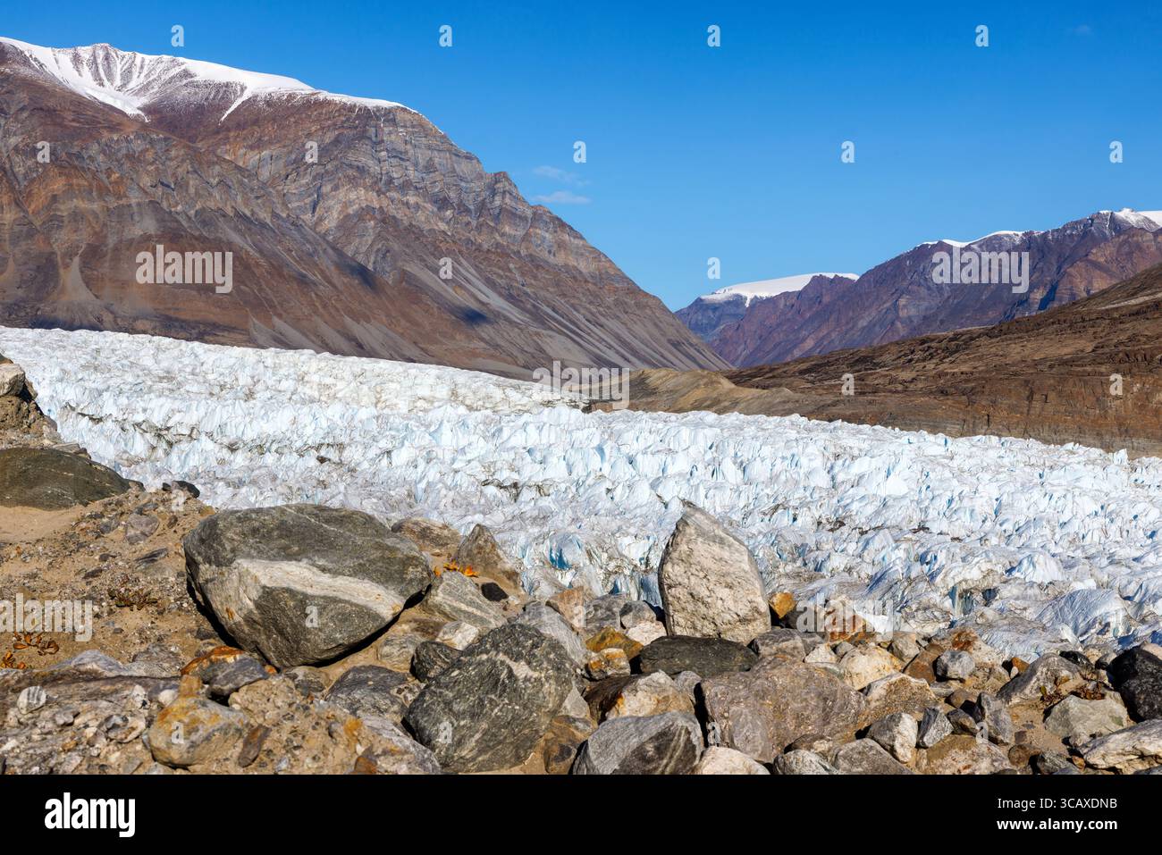 Geological layers above Hisinger Glacier, with a hanging glacier beyond ...