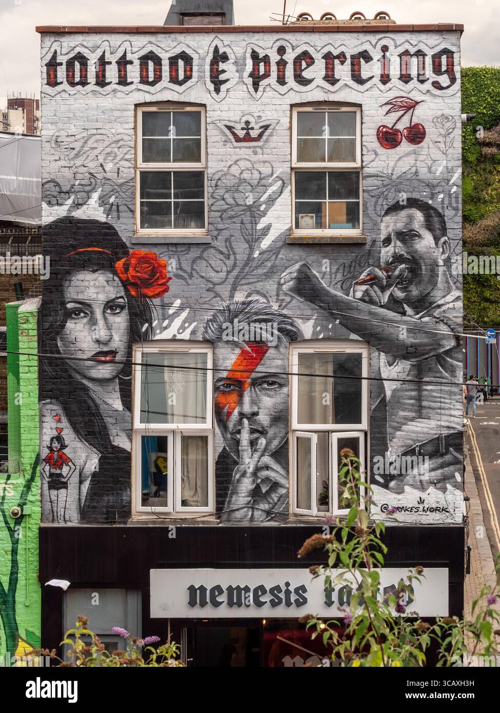 A large street art mural depicting music legends Amy Winehouse, David ...