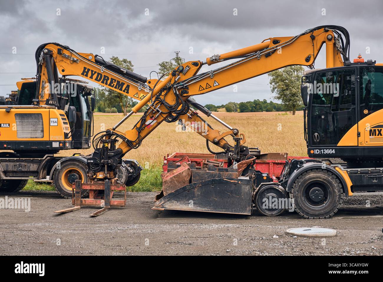 August 3, 2025; Höör, Sweden: Two Hydrema MX16 rail excavators parked ...