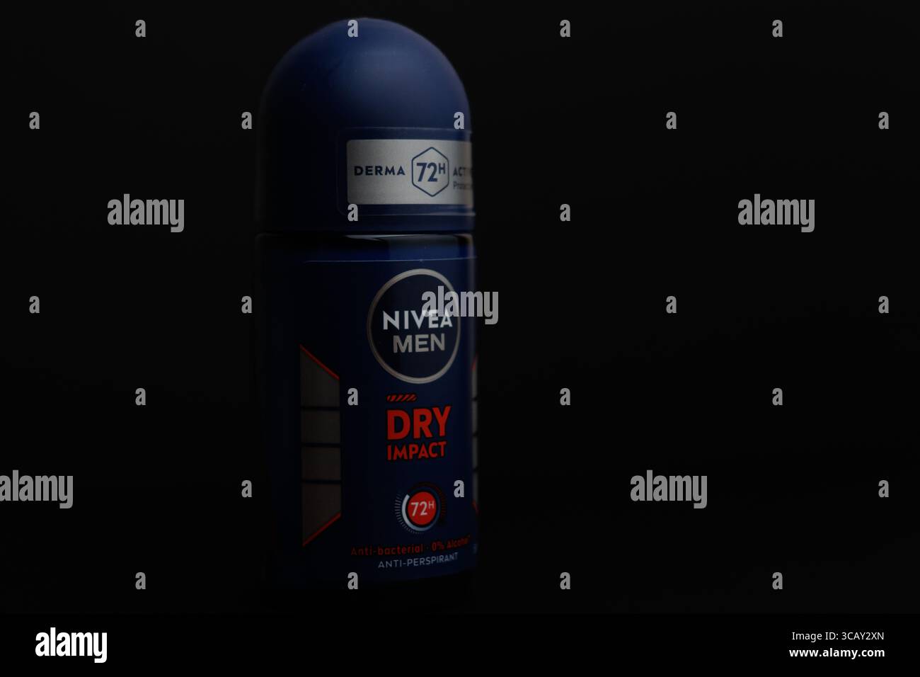 Nivea Men roll-on deodorant with a black background photographed in ...