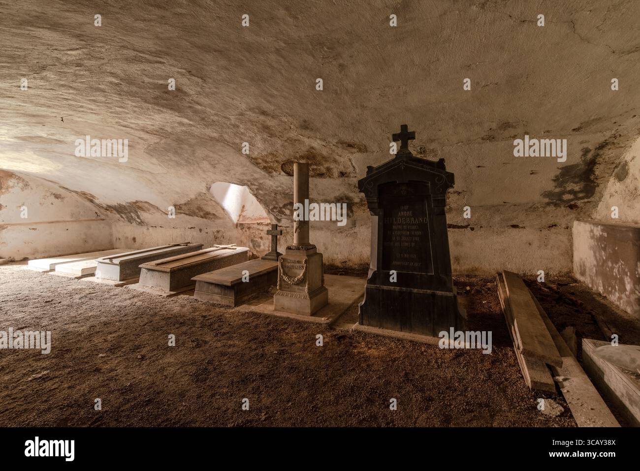 Abandoned Crypt Interior with Historic Tombstones and Soft Natural ...