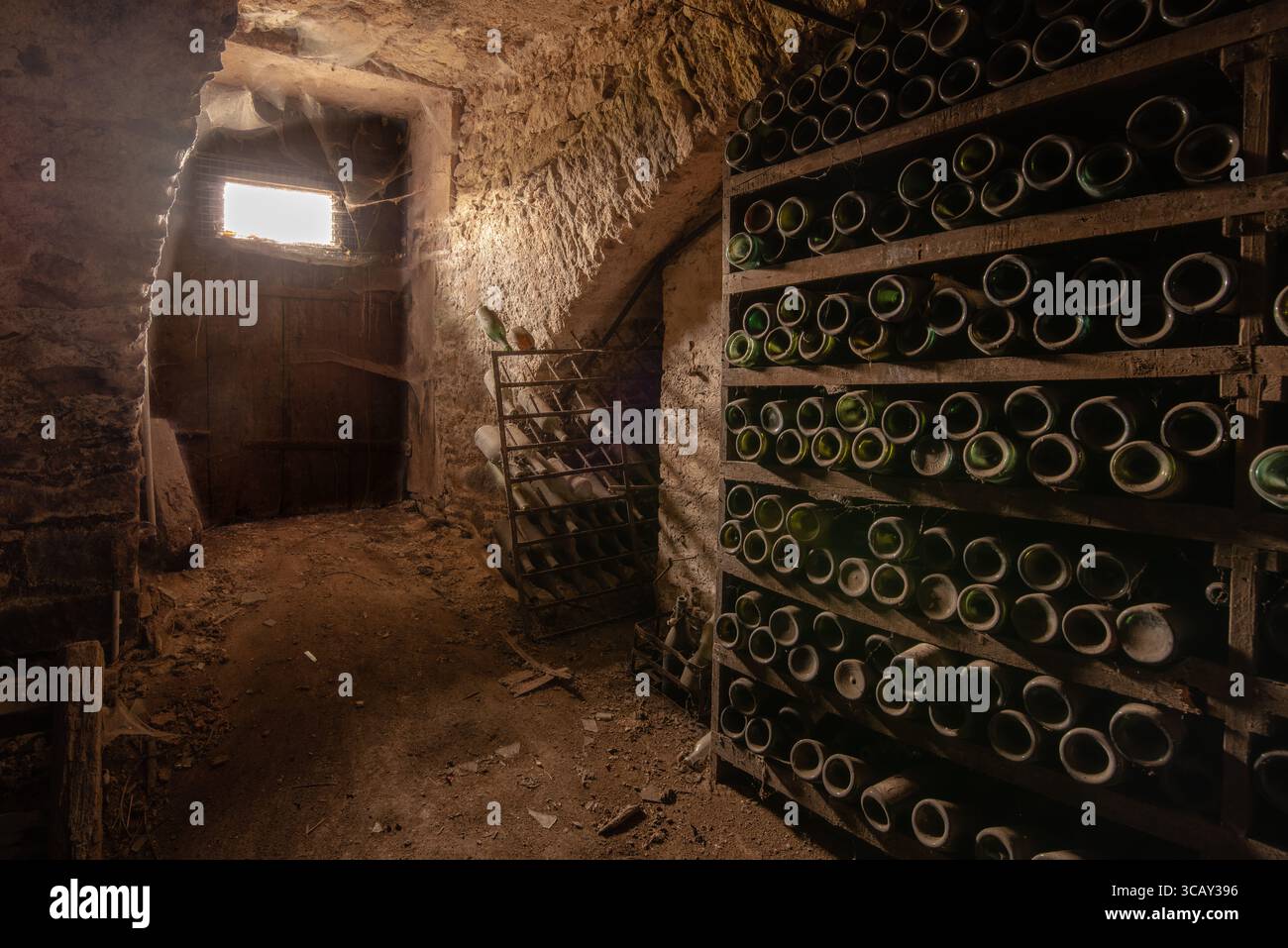 Dusty Wine Cellar in Abandoned Château with Rows of Old Bottles and ...
